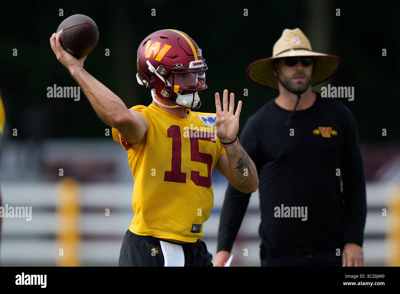 Washington Commanders quarterback Sam Hartman (15) throws during ...