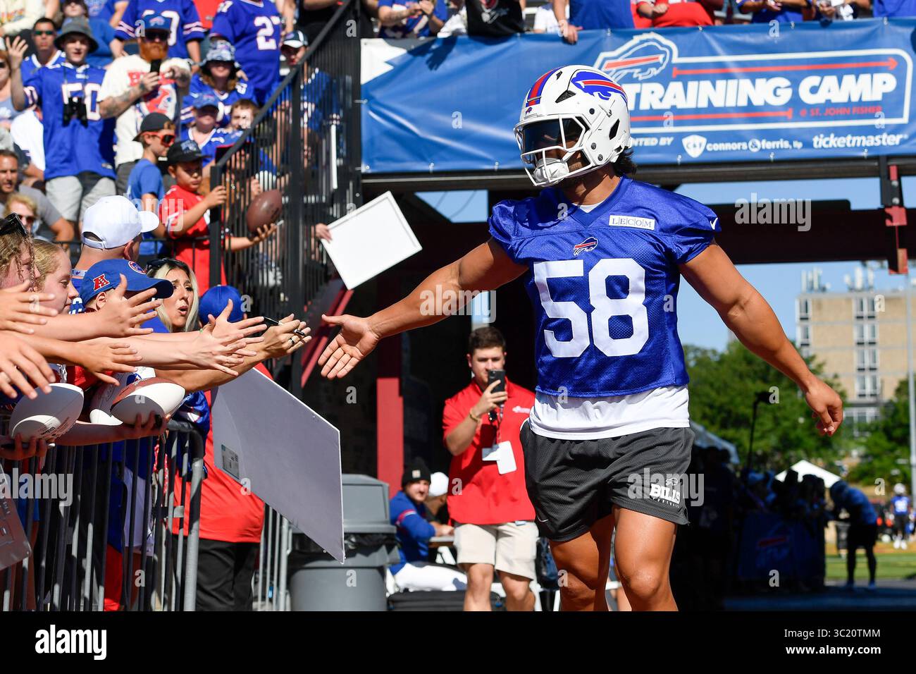 Buffalo Bills linebacker Matt Milano (58) greets fans as he walks to ...