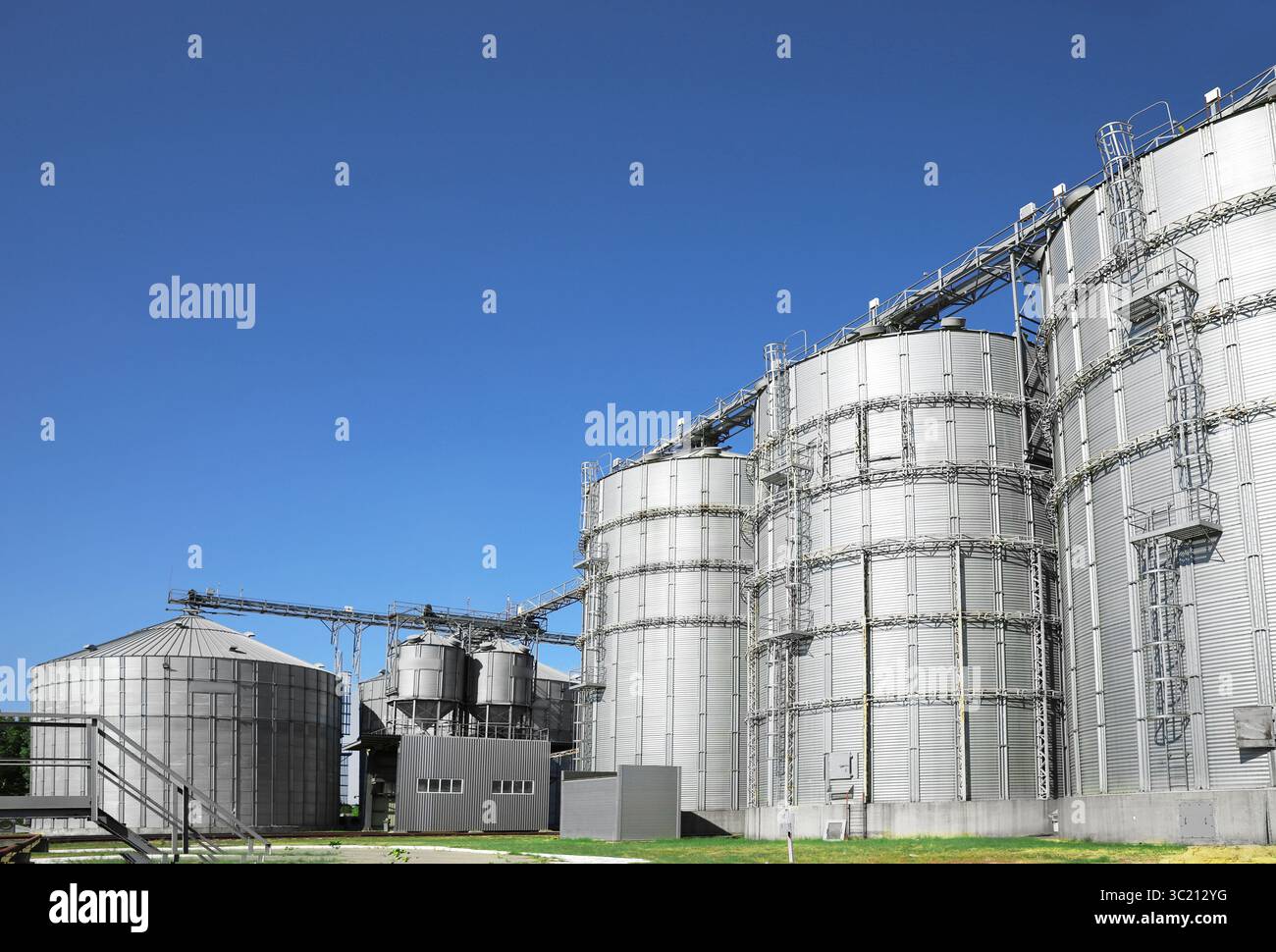 Modern granaries for storing cereal grains outdoors Stock Photo - Alamy