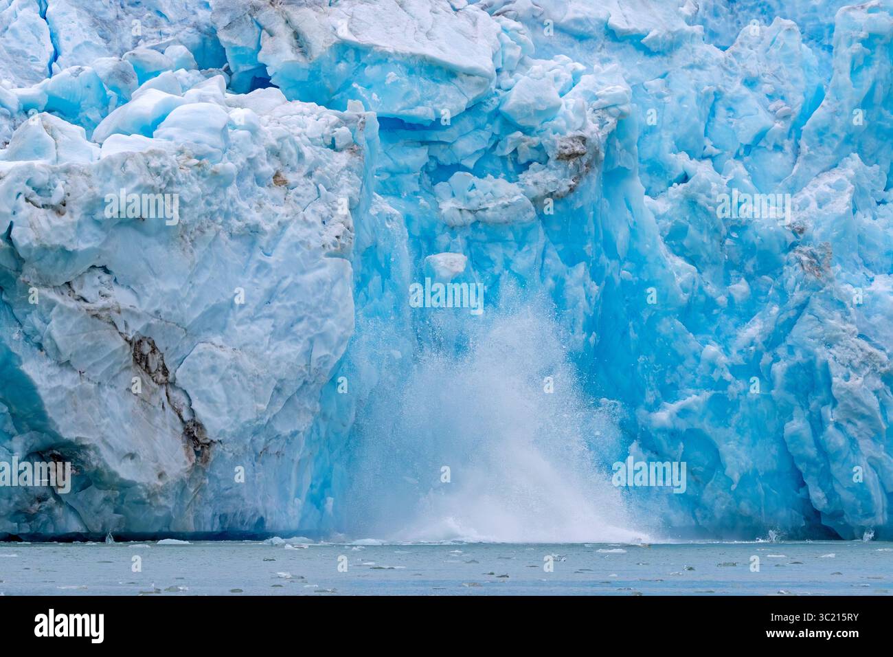 Collapsing ice wall of Fjortende Julibreen / 14th of July Glacier ...