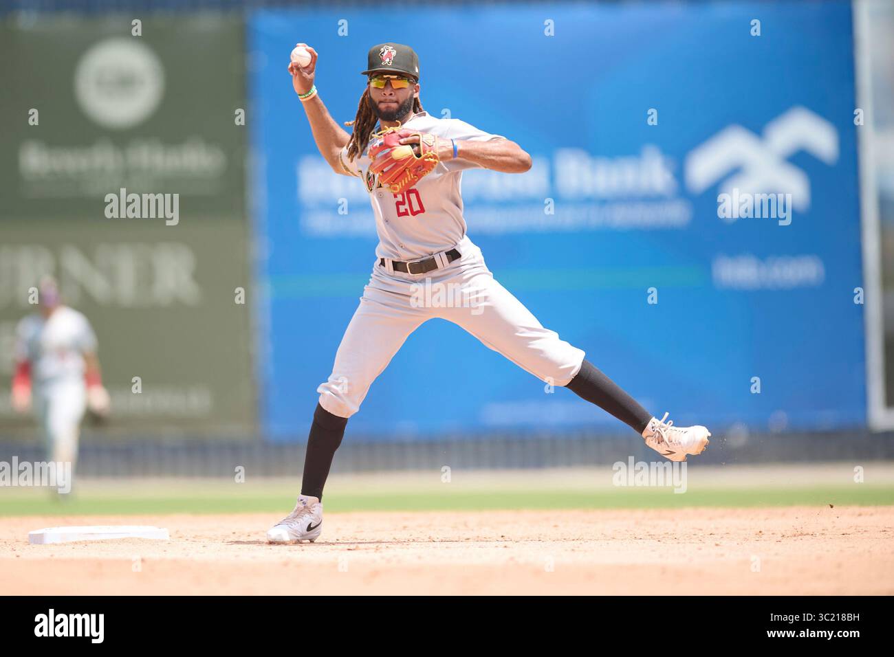 Rome Emperors second baseman Ambioris Tavarez (20) makes the turn on a double play during a game ...