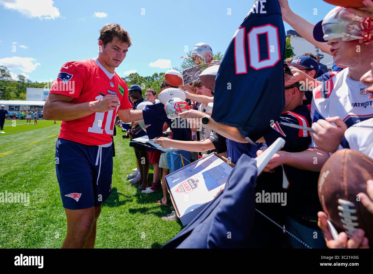 New England Patriots quarterback Drake Maye signs autographs following ...
