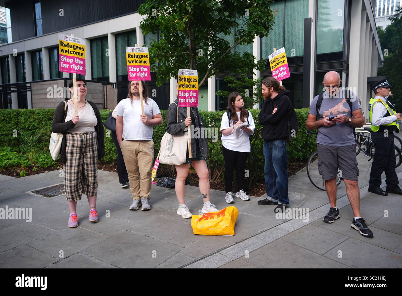 A group of counter-protesters outside the Britannia International Hotel ...