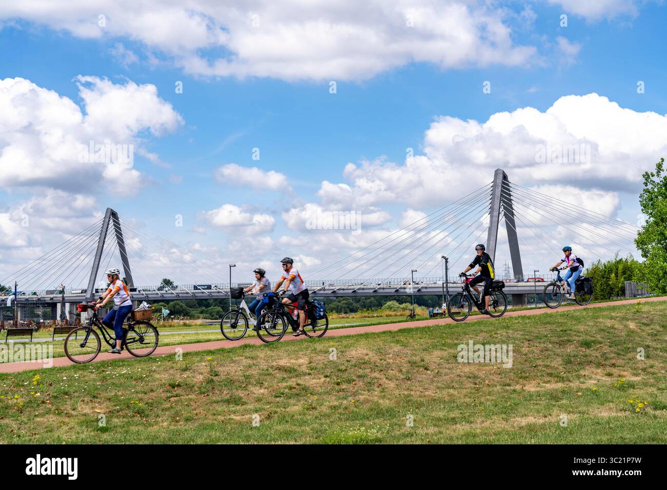 Bike path in Neulandpark in Leverkusen on the Rhine, with the new Rhine ...