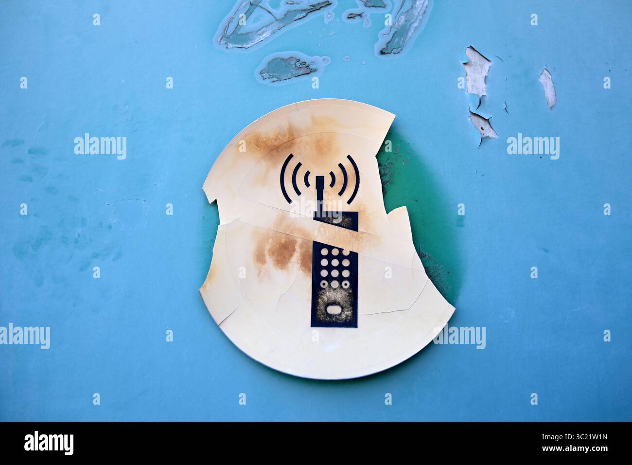 Destroyed sign: NO MOBILE PHONES Stock Photo - Alamy