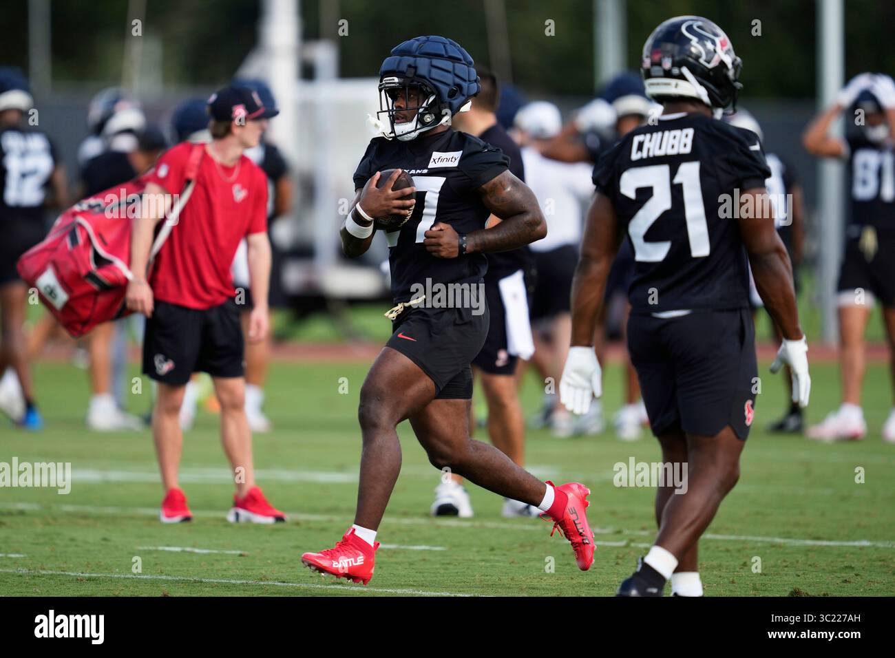 Houston Texans running back Woody Marks (27) works out during the team ...