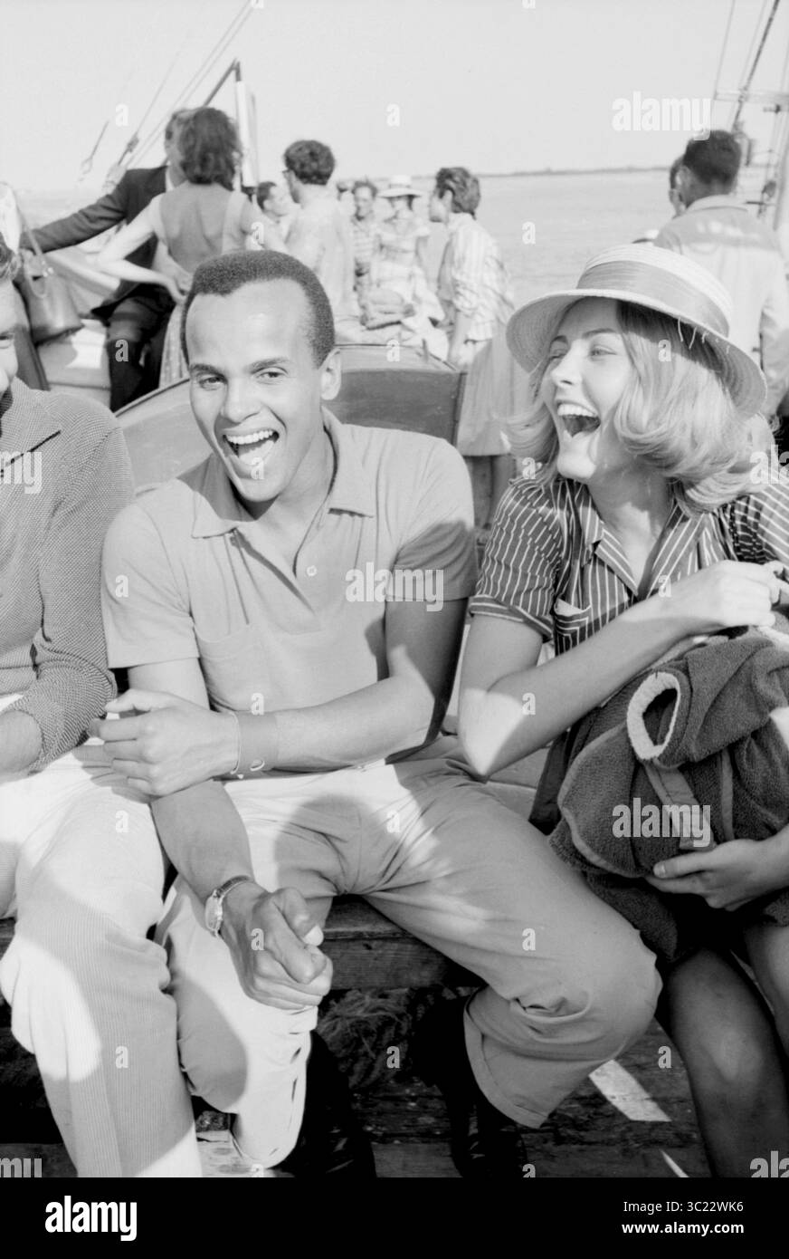 American singer and actor Harry Belafonte smiling during a boat trip ...
