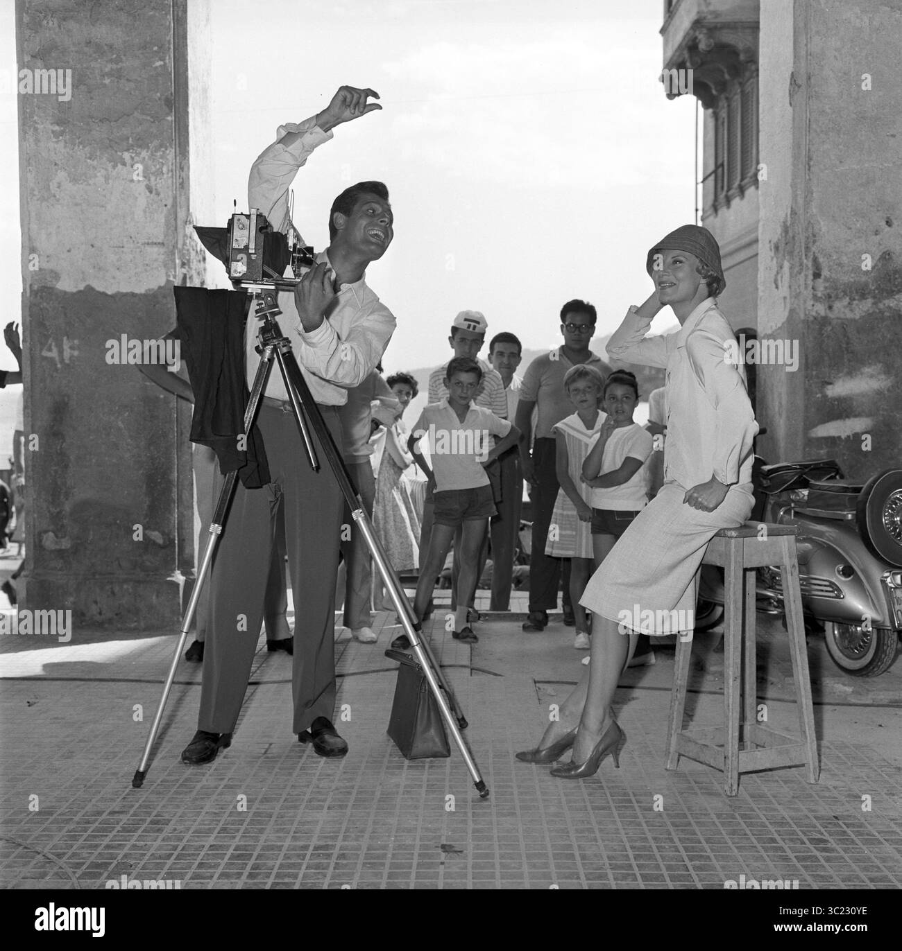 Italian actor Marcello Mastroianni taking pictures of French actress ...