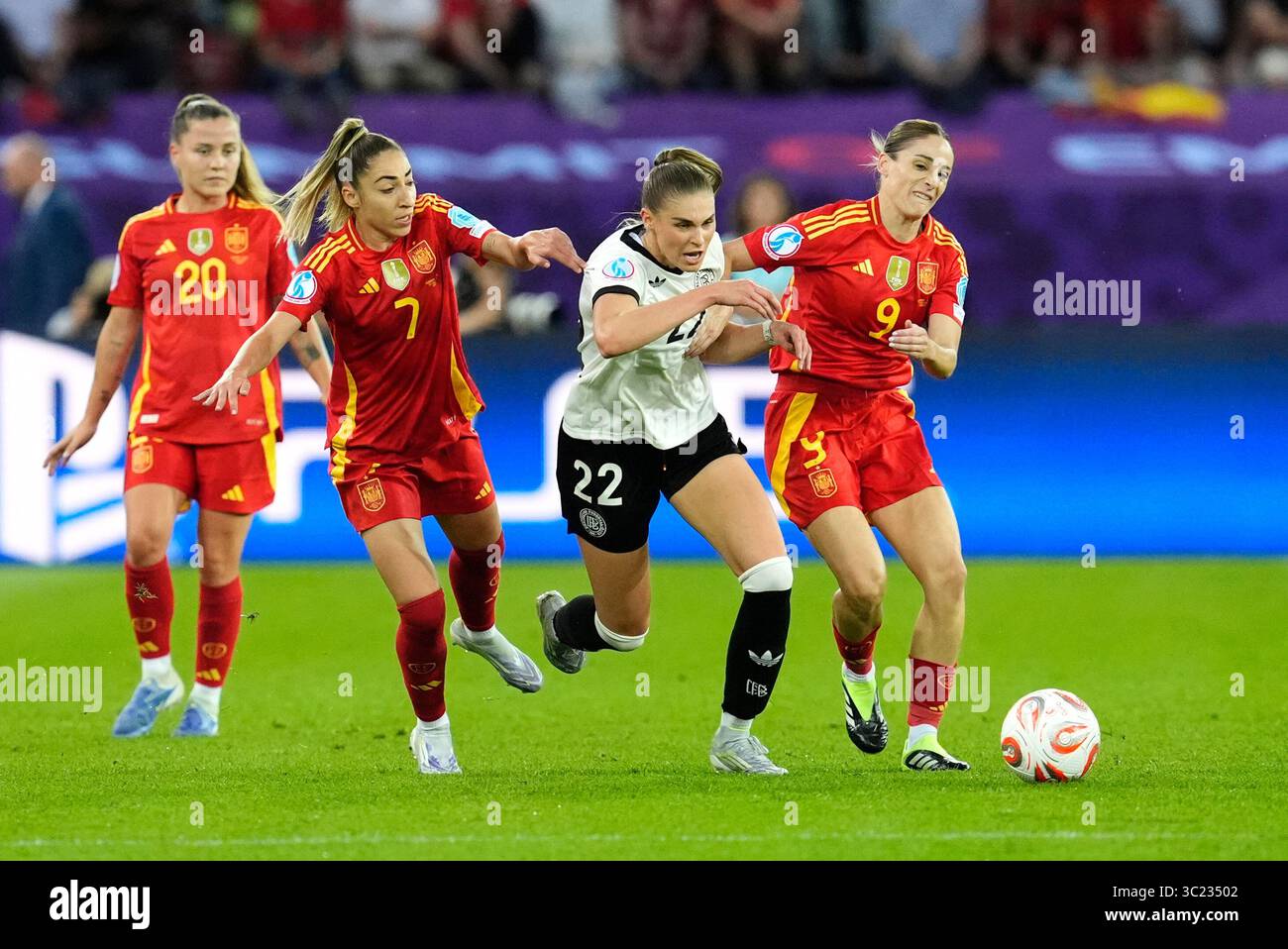 Germany's Jule Brand (centre) battles with Spain's Olga Carmona (left ...