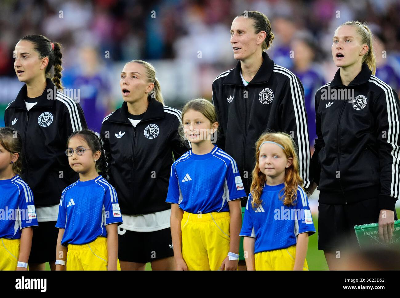(left to right) Germany's Sara Dabritz, Elisa Senss, goalkeeper Ann ...