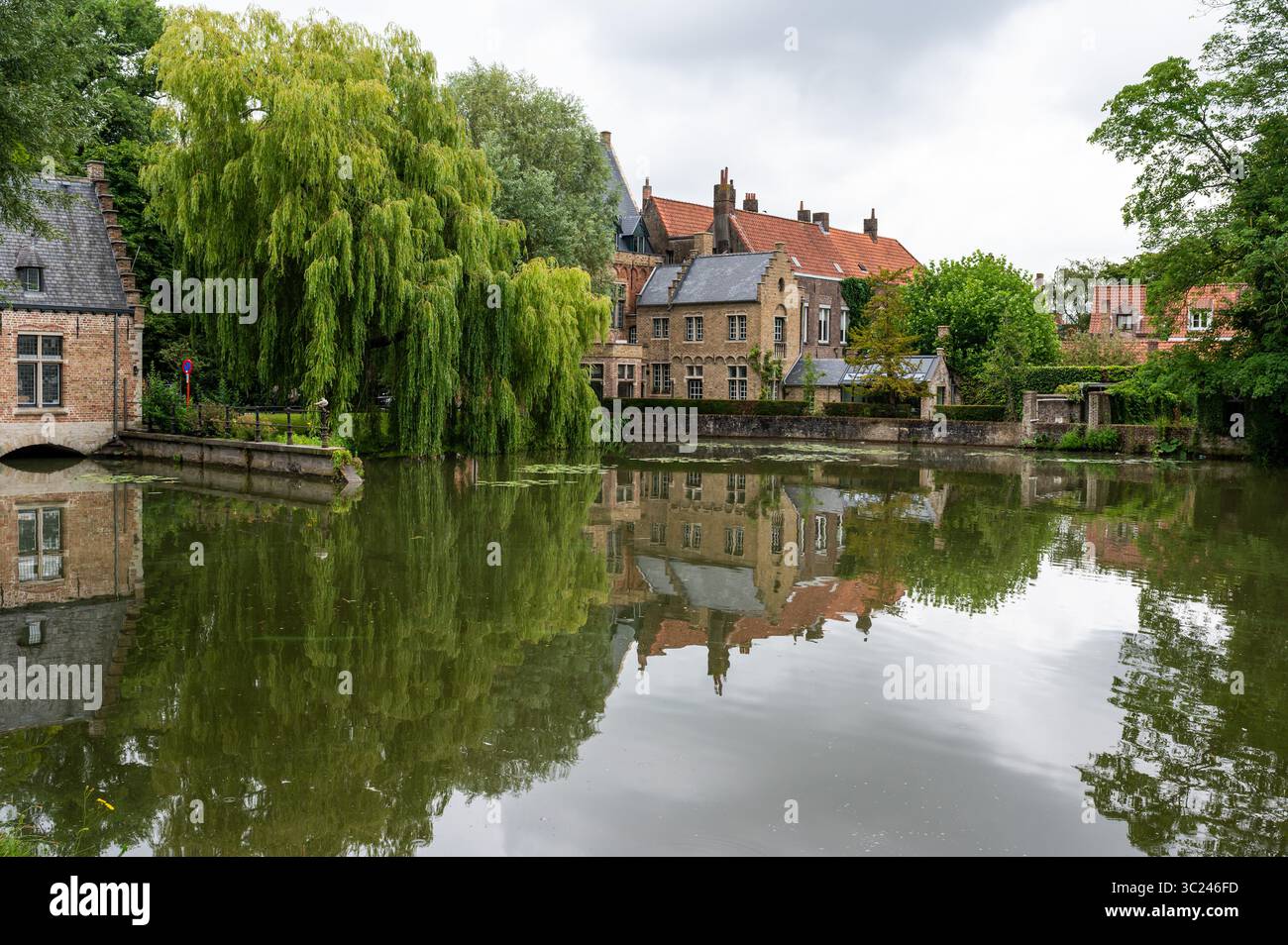 The Minnewater park and beguinage in the city center of Bruges, West ...