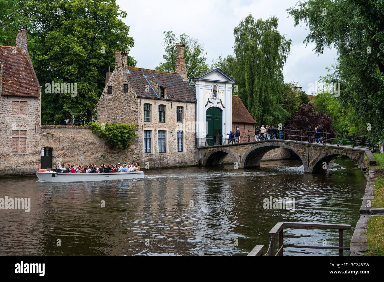 The Minnewater park and beguinage in the city center of Bruges, West ...