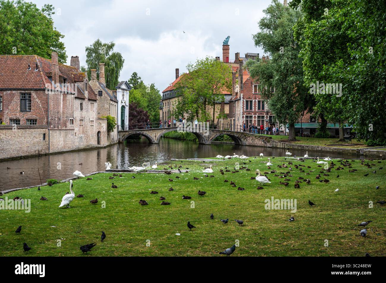 The Minnewater park and beguinage in the city center of Bruges, West ...