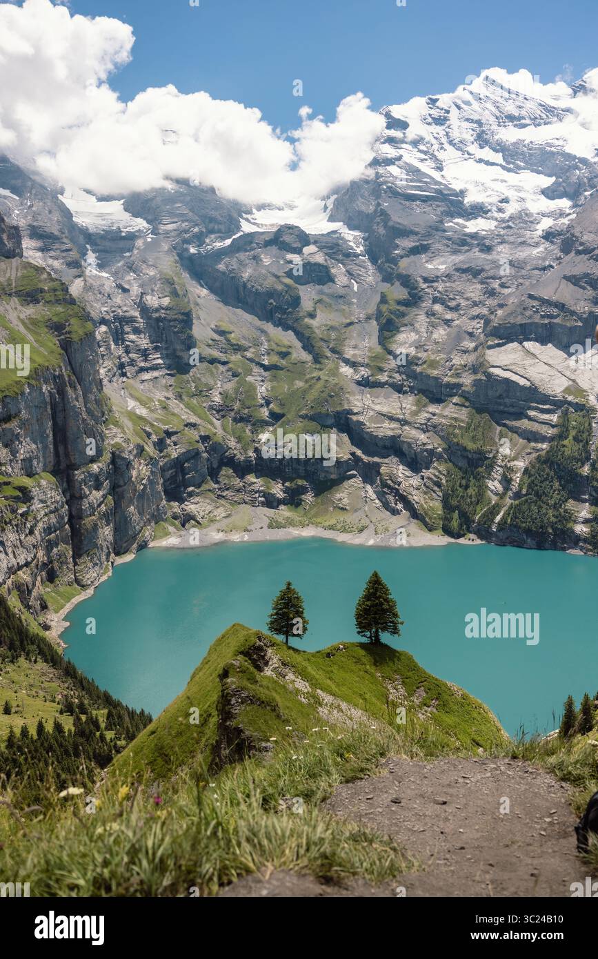 Swiss mountains: Nestled deep in the Bernese Alps, Lake Oeschinen ...