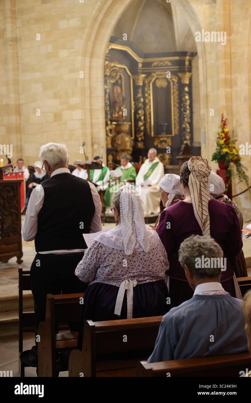 Catholic mass in the Occitan language and in traditional Périgord dress ...