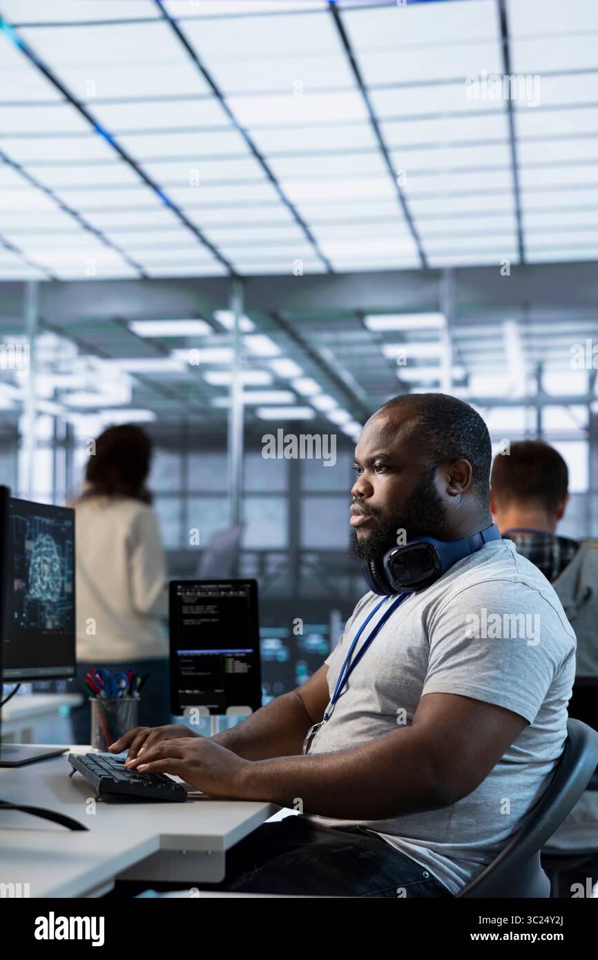 Engineer working in high tech artificial intelligence establishment ...