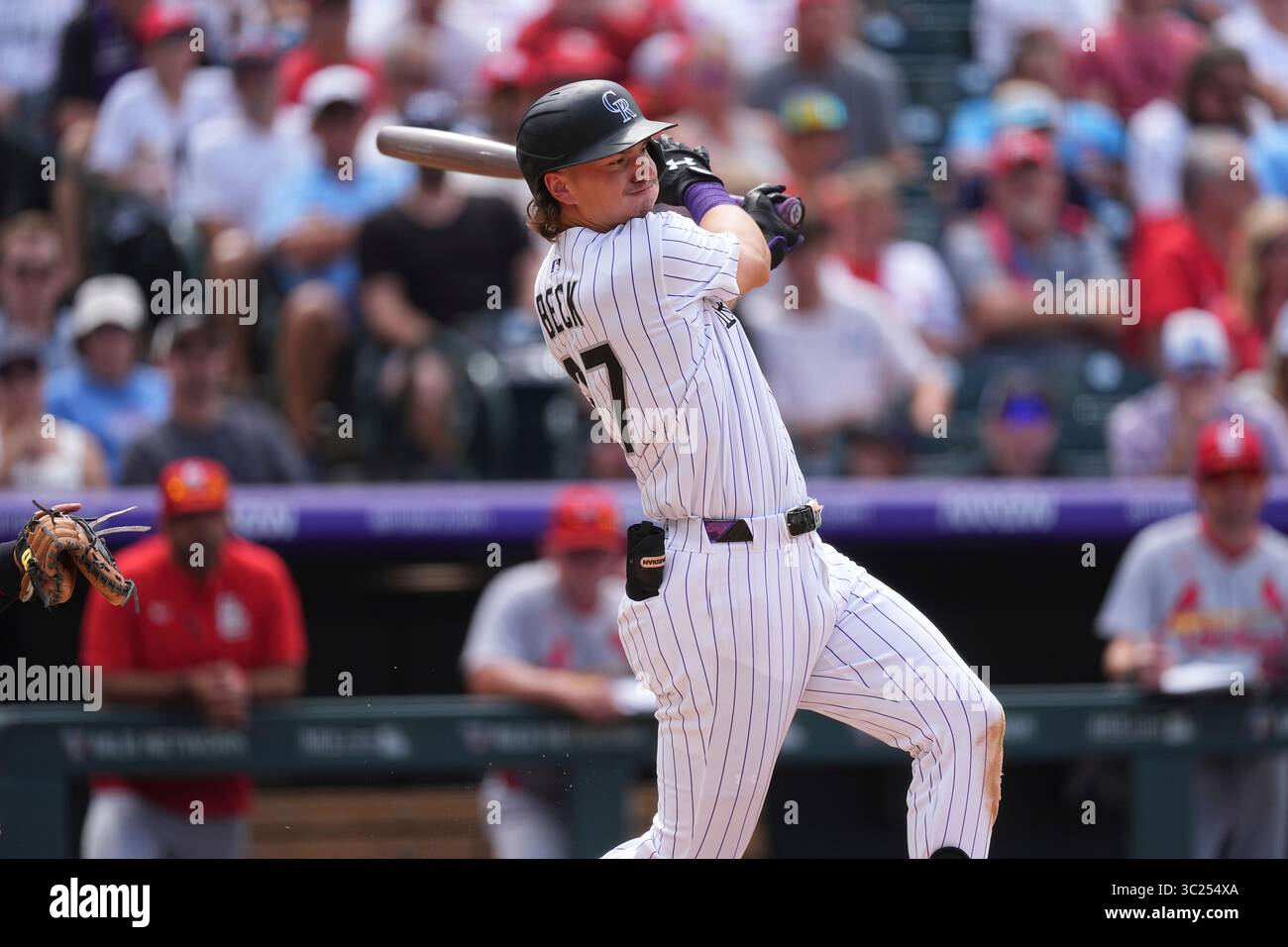 Colorado Rockies' Jordan Beck singles against St. Louis Cardinals ...