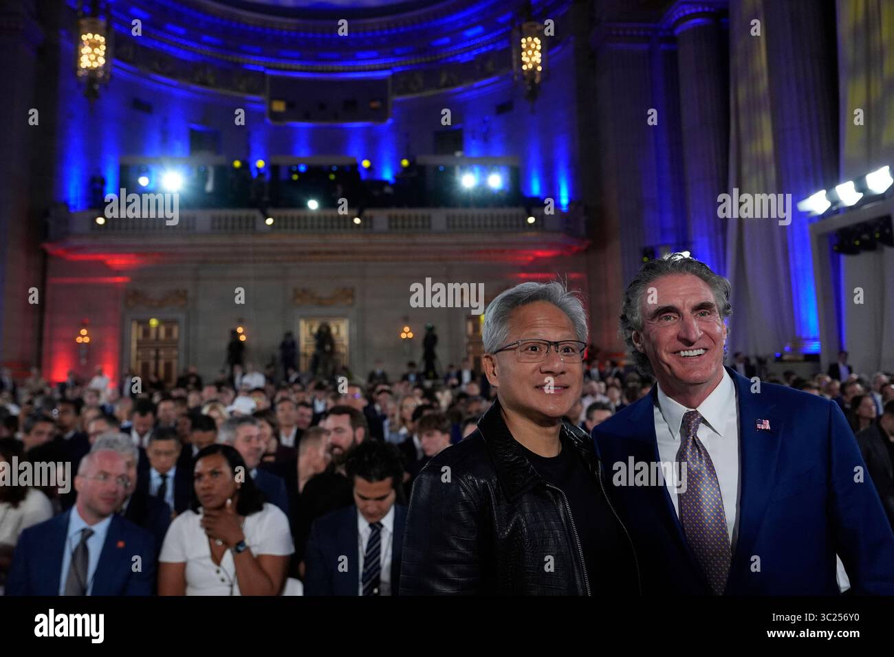 Nvidia CEO Jensen Huang poses for a photo with Interior Secretary Doug ...