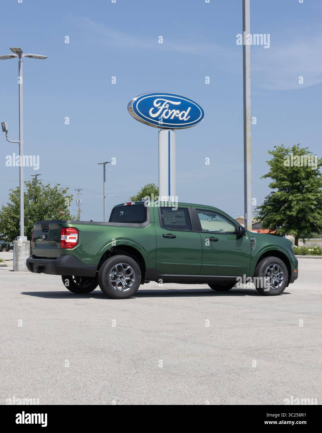 Muncie - July 22, 2025: Ford Maverick XLT FWD Truck display at a ...