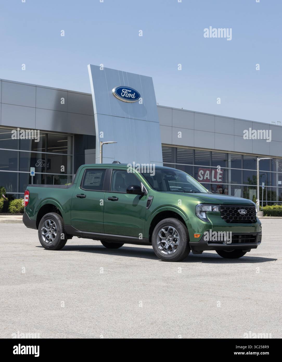Muncie - July 22, 2025: Ford Maverick XLT FWD Truck display at a ...