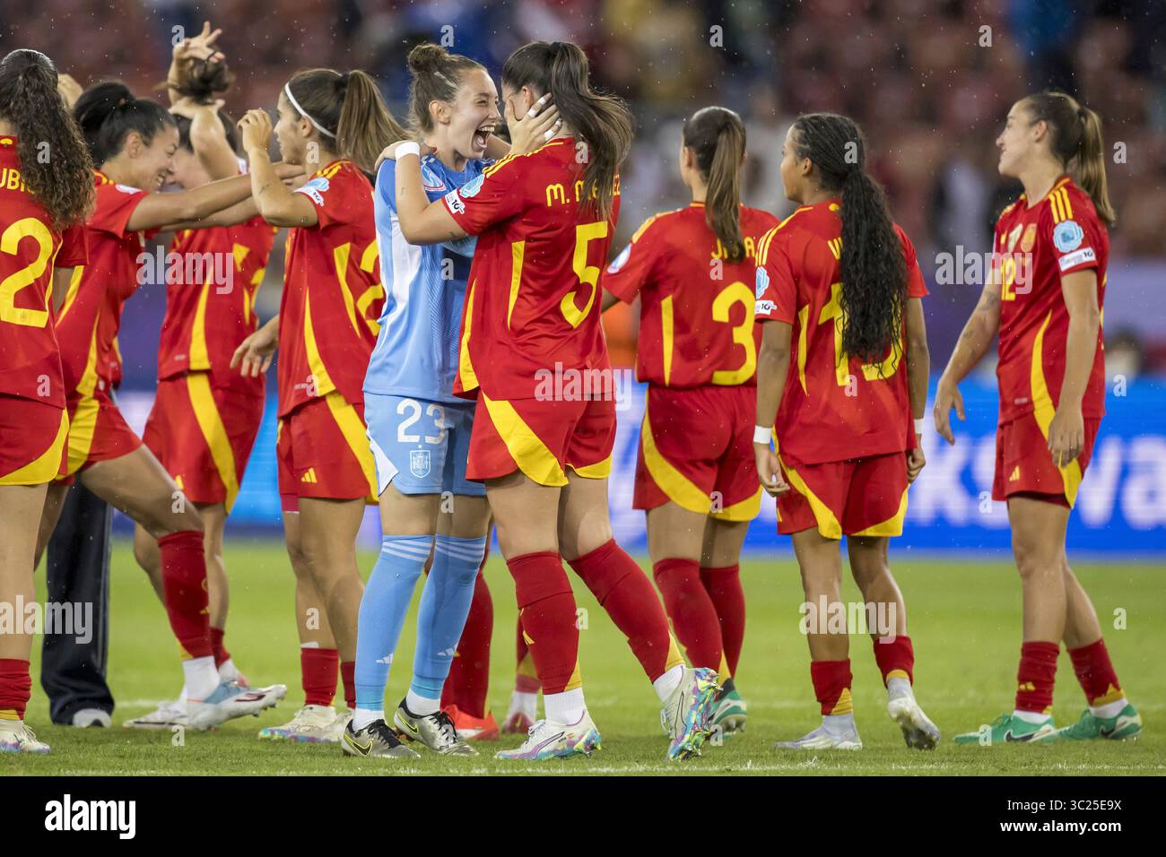 Spain's Adriana Nanclares (23) and Maria Mendez (5) embrace after the ...