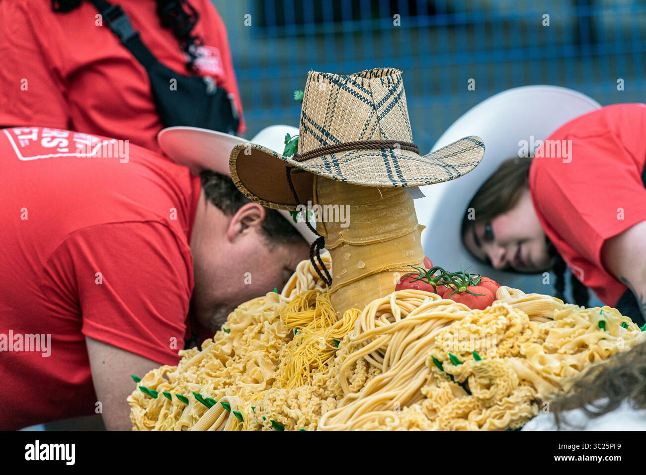 Getting a spaghetti western styled parade float ready for the start of ...