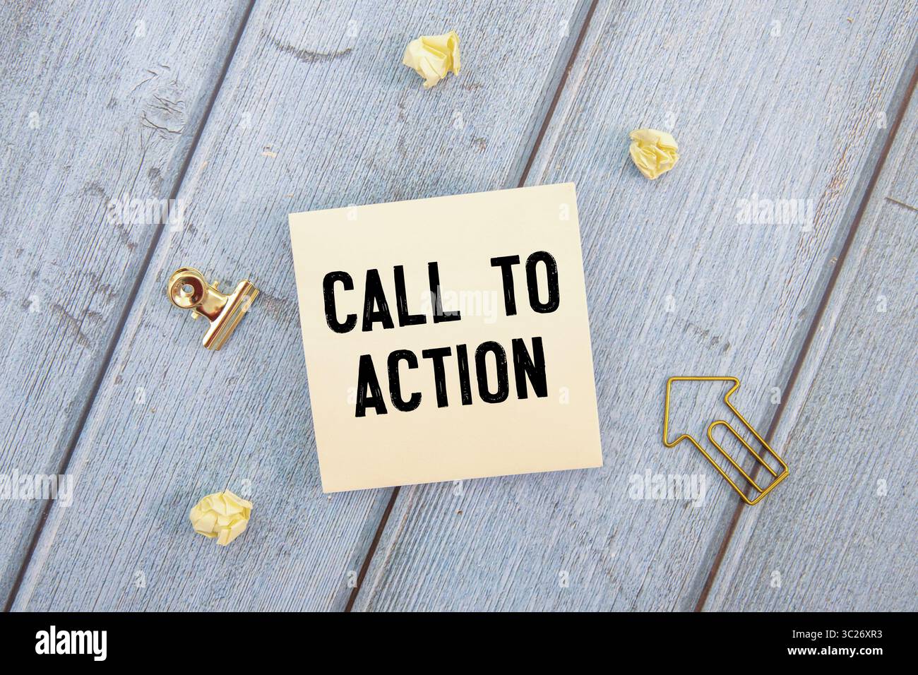 Call to action message written on wooden blocks with blue background ...