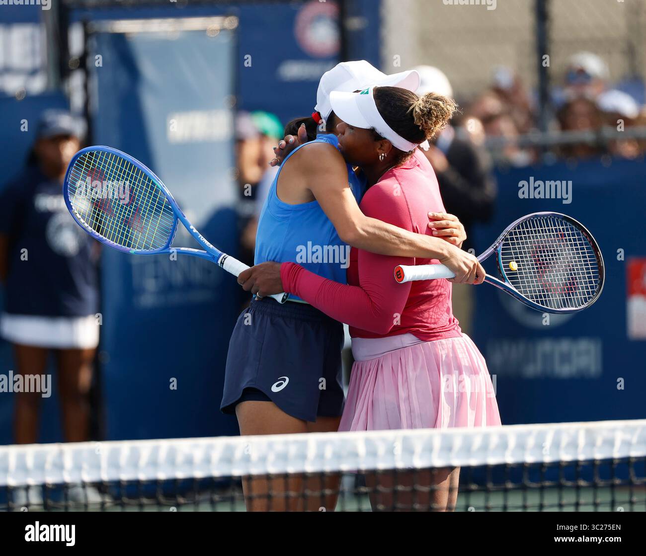 July 23, 2025: Shuai Zhang and Taylor Townsend hug to celebrate their ...