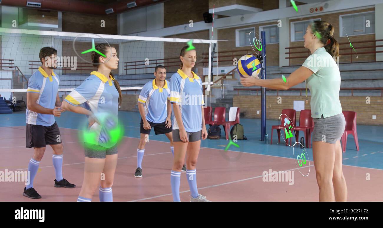 Sports coach guiding volleyball team hi-res stock photography and ...