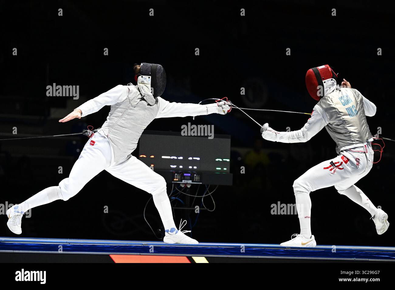 Hong Kong's Ryan Choi Chun Yin (R) fights against Kirill Borodachev of ...