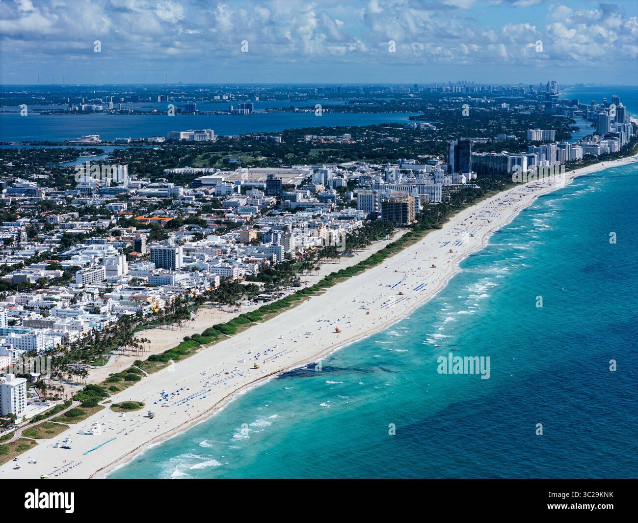 Aerial view of South Pointe Beach, Fisher Island, and Downtown Miami ...