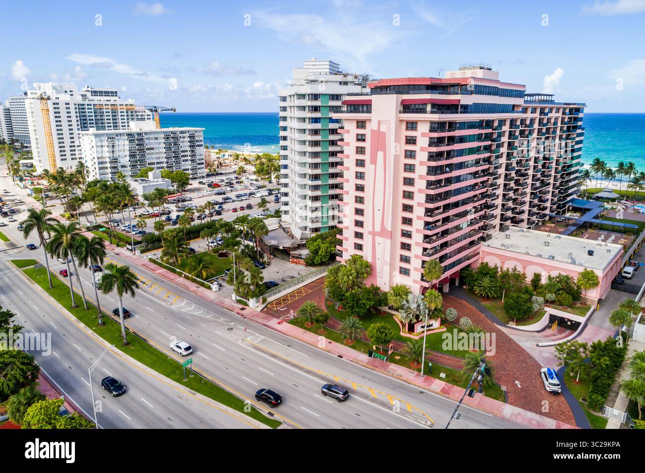 Cars driving on collins avenue hi-res stock photography and images - Alamy