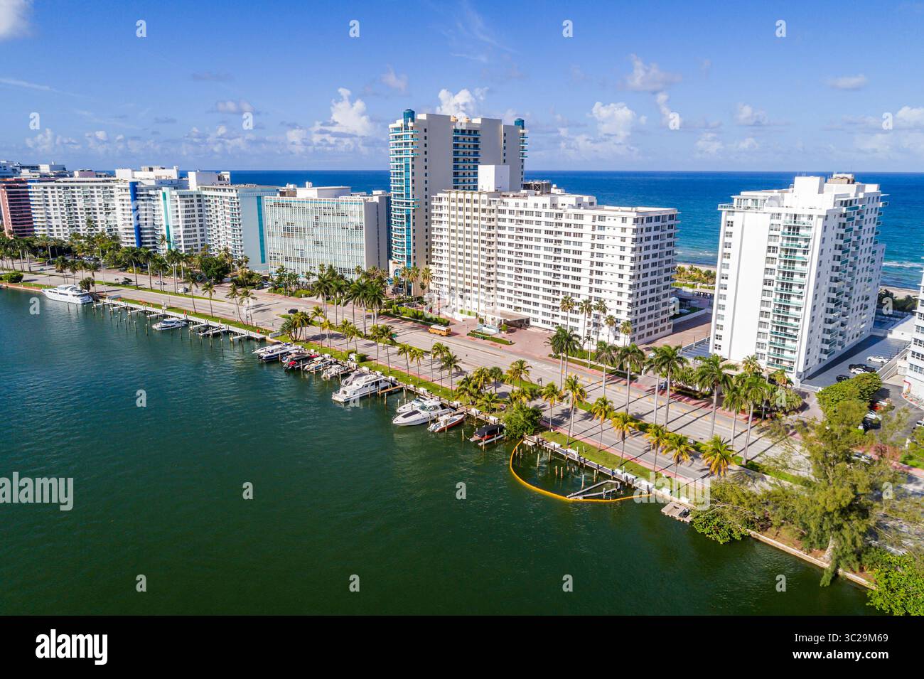 Tall buildings spaced around courtyard drives and hotel style entrances ...