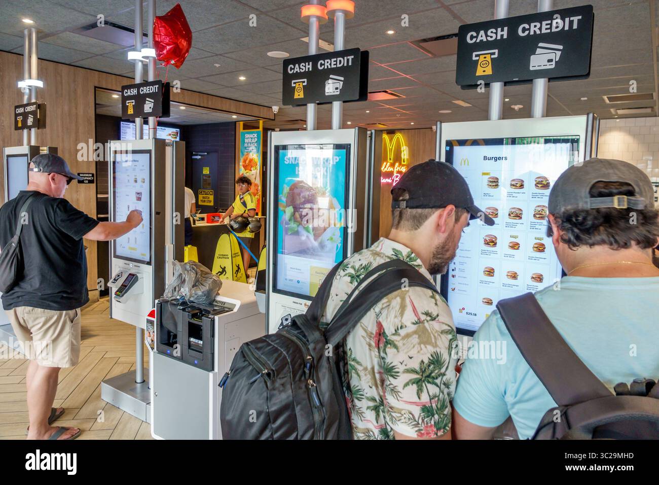 Miami Beach Florida,Washington Avenue,McDonald's fast food restaurant,inside interior,men male ...