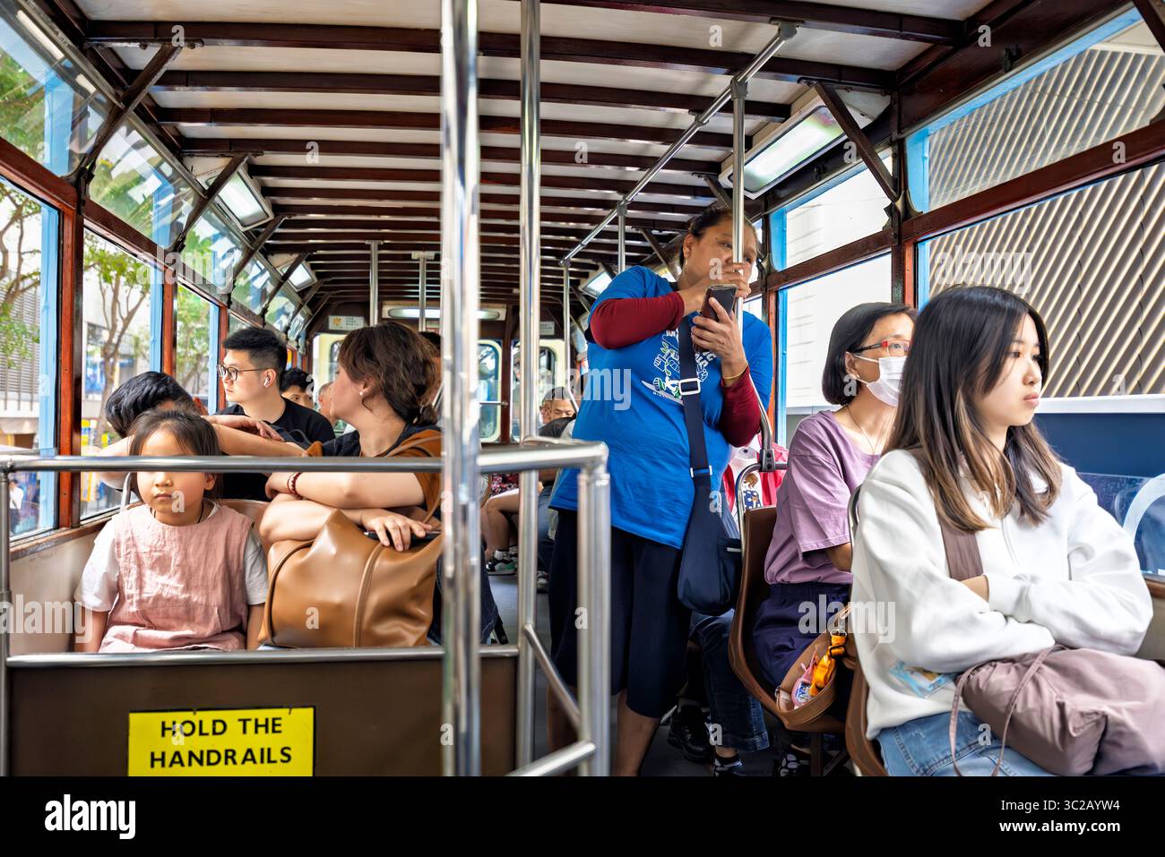 Passengers and interior, Hong Kong island tram, SAR, China Stock Photo ...