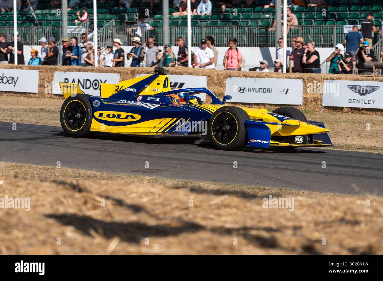 Lola T001 Formula E racing car on the hillclimb track at the Goodwood ...