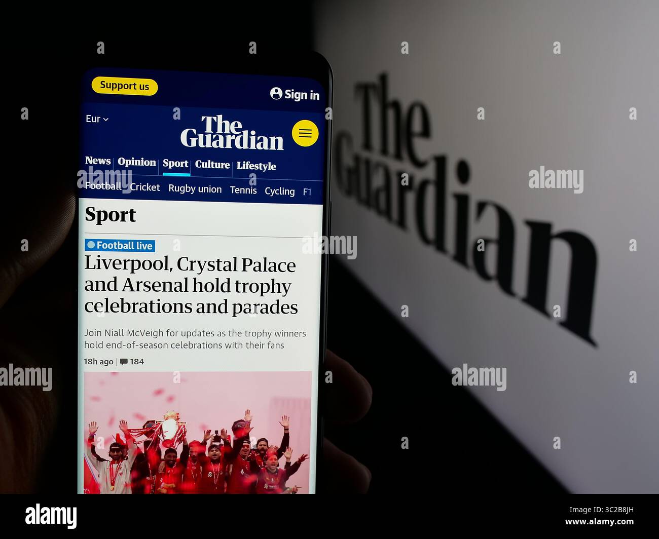 Stuttgart, Germany - 05-27-2025: Person holding cellphone with webpage ...