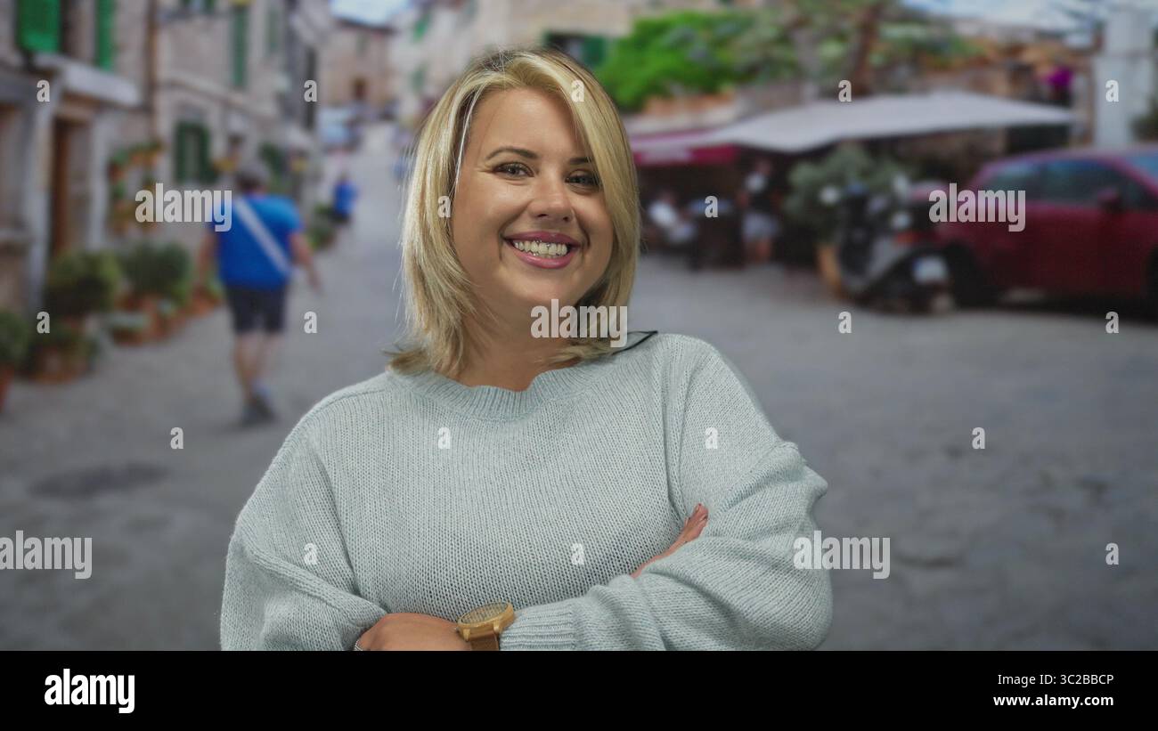 Woman arms crossed raised brow hi-res stock photography and images - Alamy