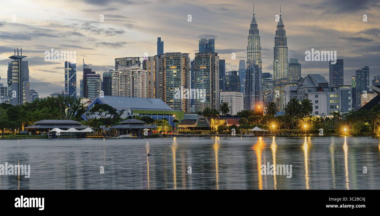 Titiwangsa Lake Garden and Kuala Lumpur city skyline at dawn, Malaysia ...