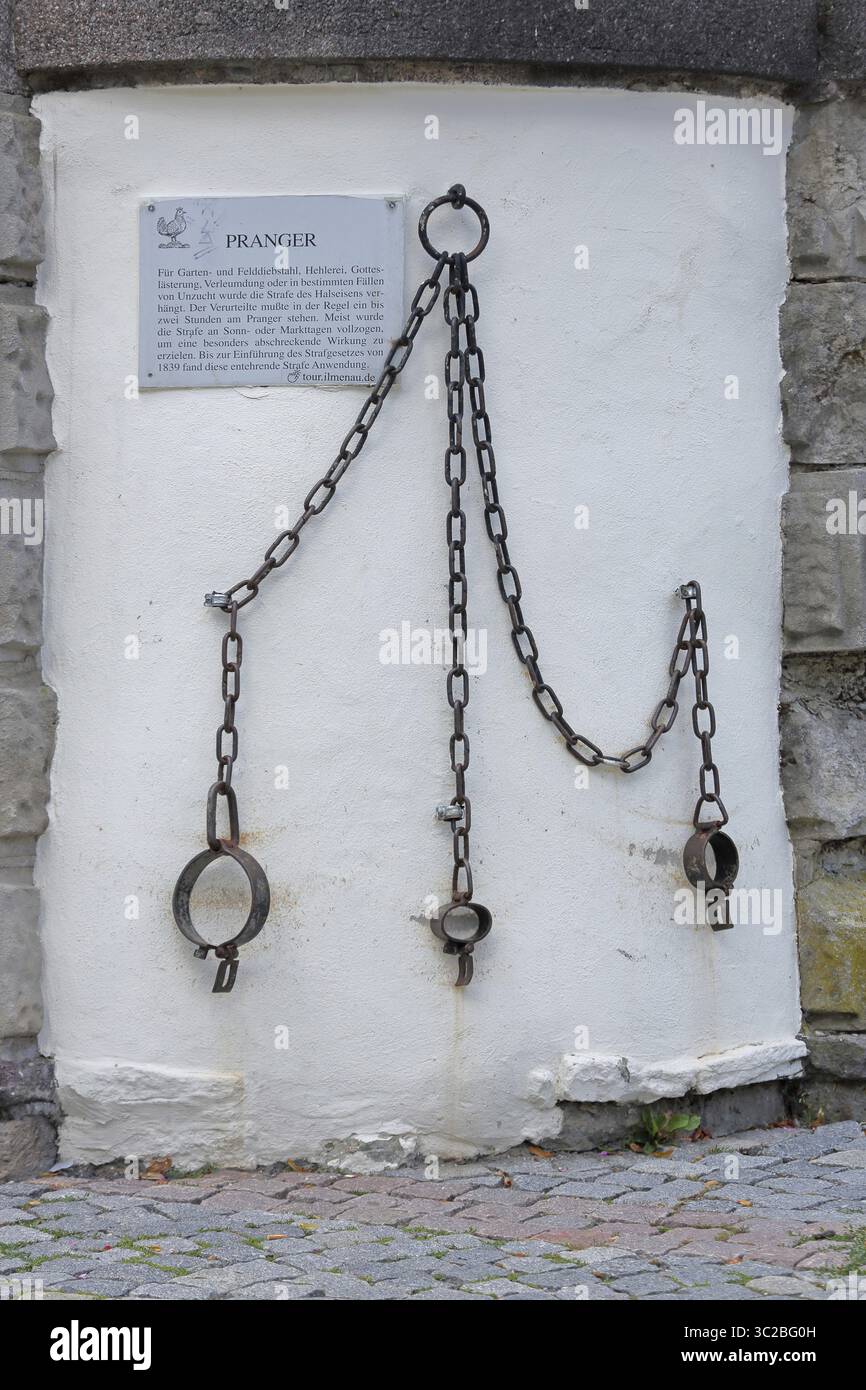 Medieval pillory with chains and rings, shackles, metal fittings ...
