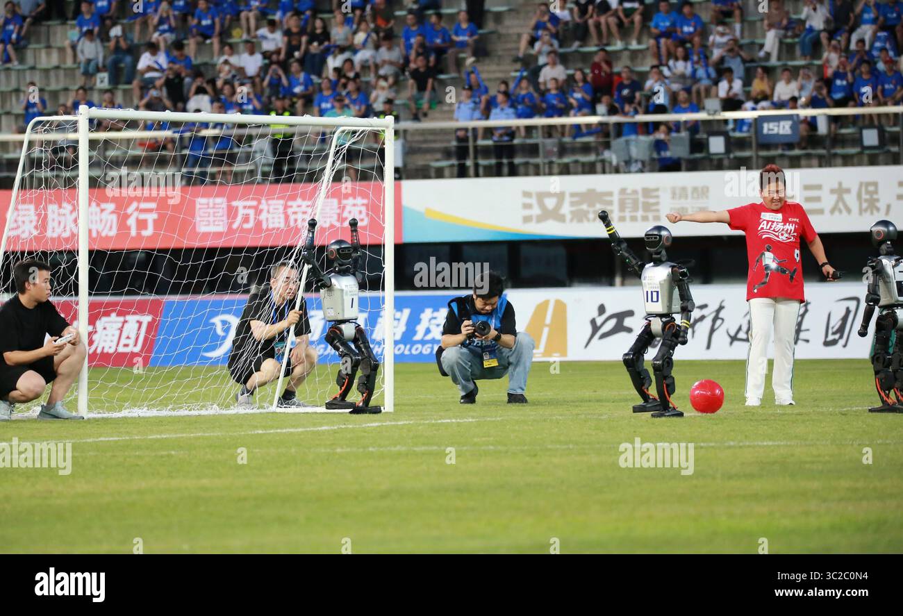 A robot soccer team makes debut in Yangzhou City, east China's Jiangsu ...