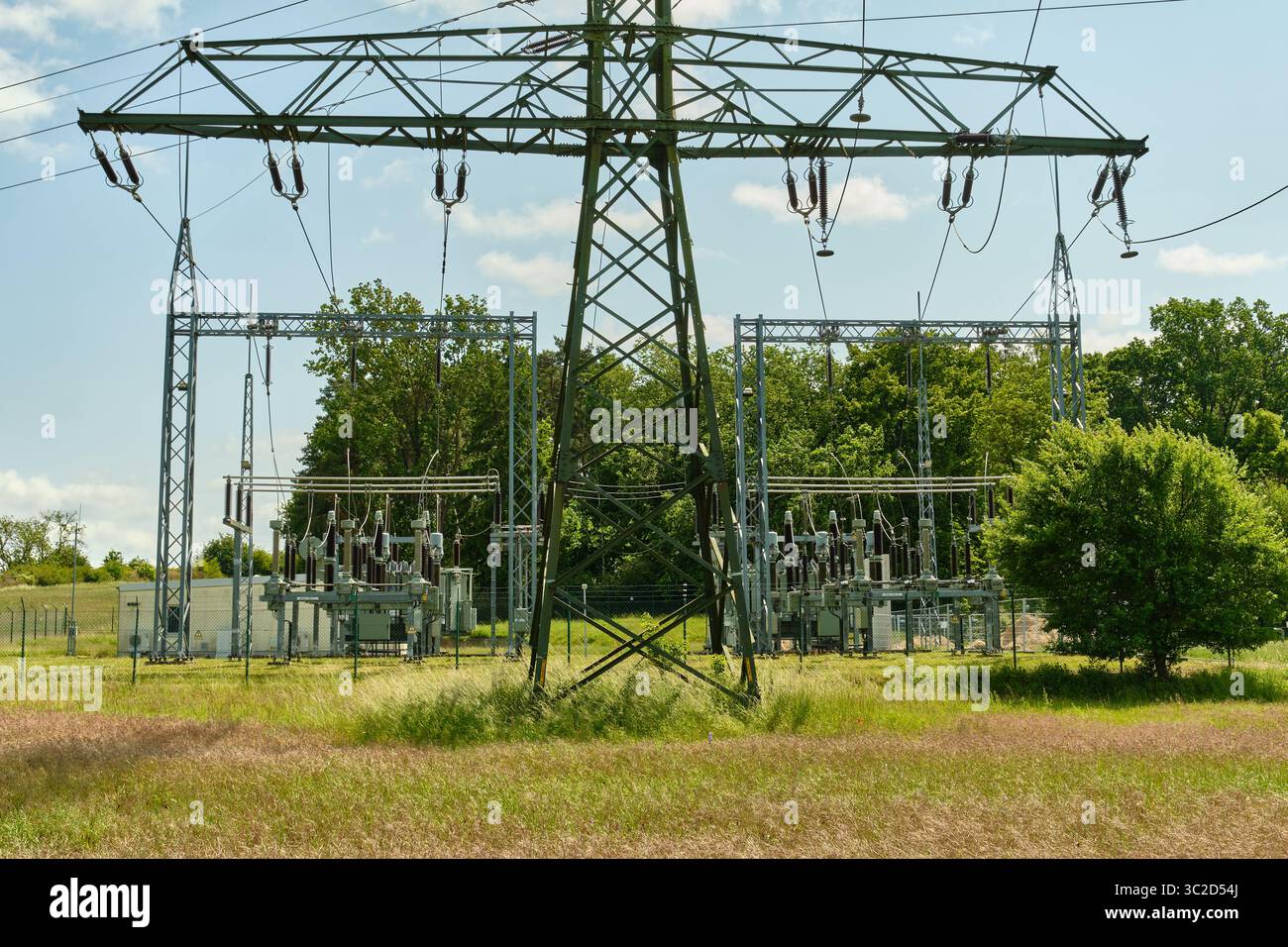 June 11, 2025 – Woldegk-Germany: High-voltage power lines and a fenced ...