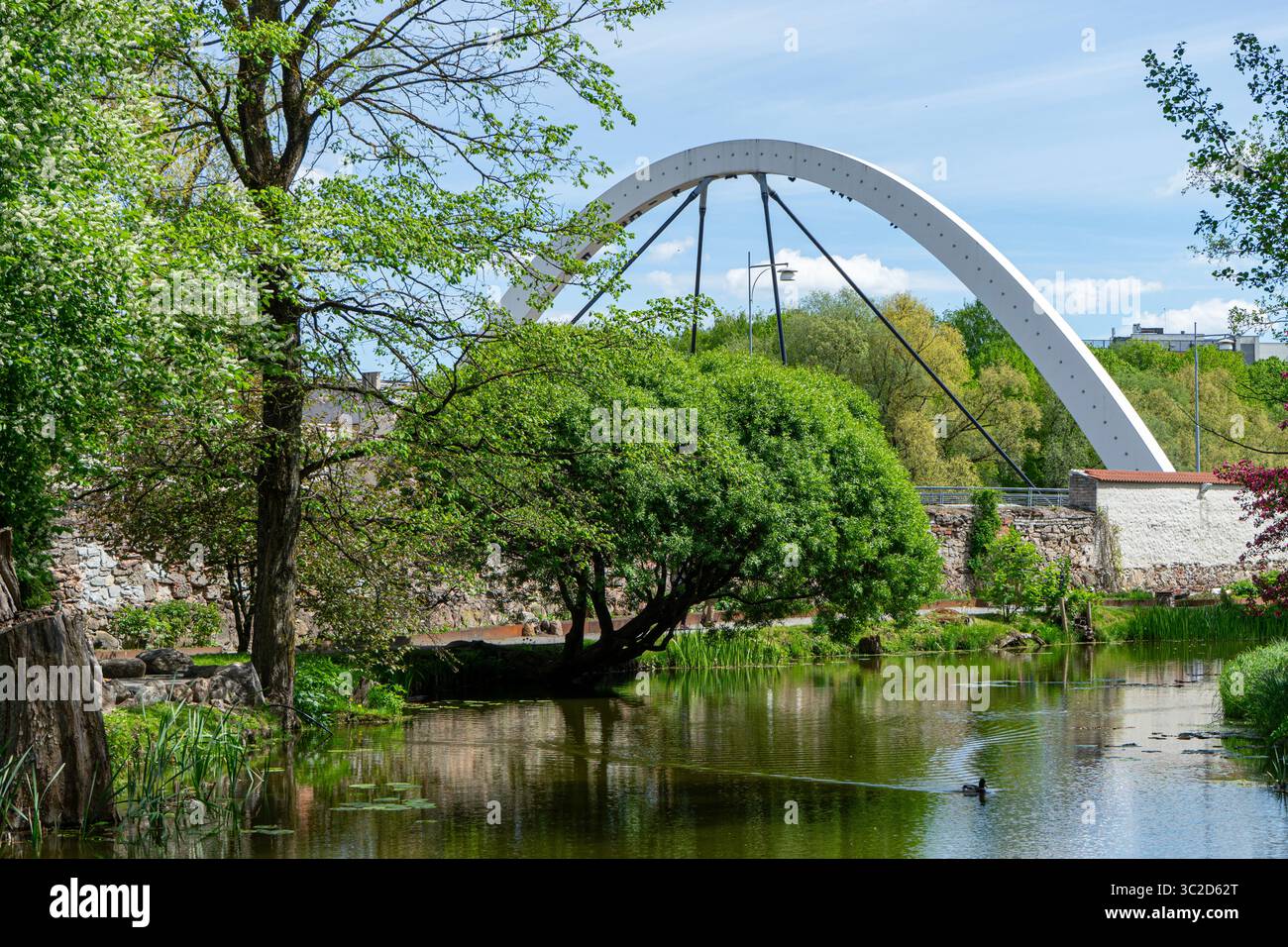 Arch bridge spanning the Emajõgi River in Tartu, Estonia, viewed from ...
