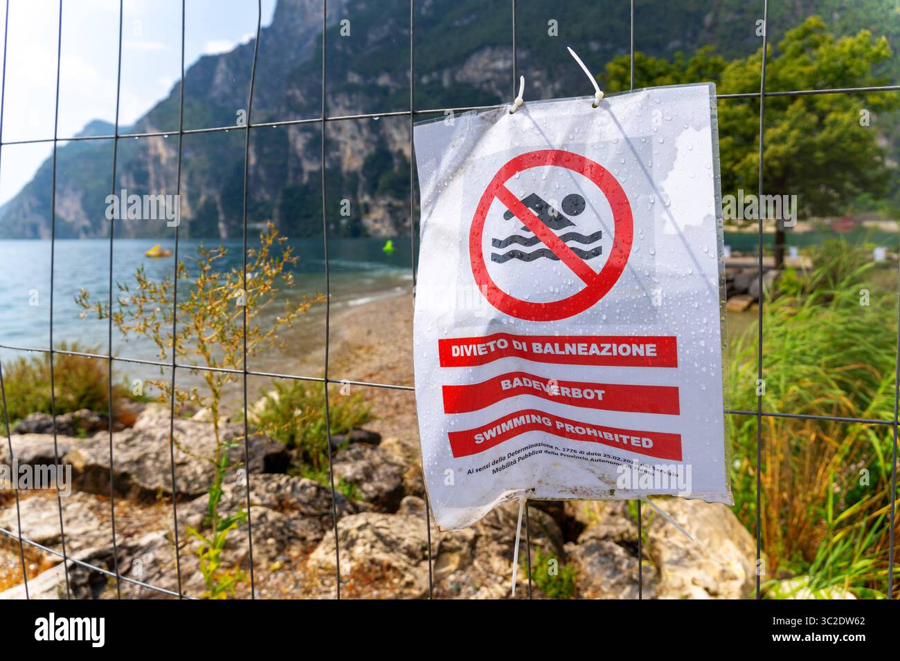 Riva del Garda, Lake Garda, Italy July 23, 2025: On the beach of Riva ...