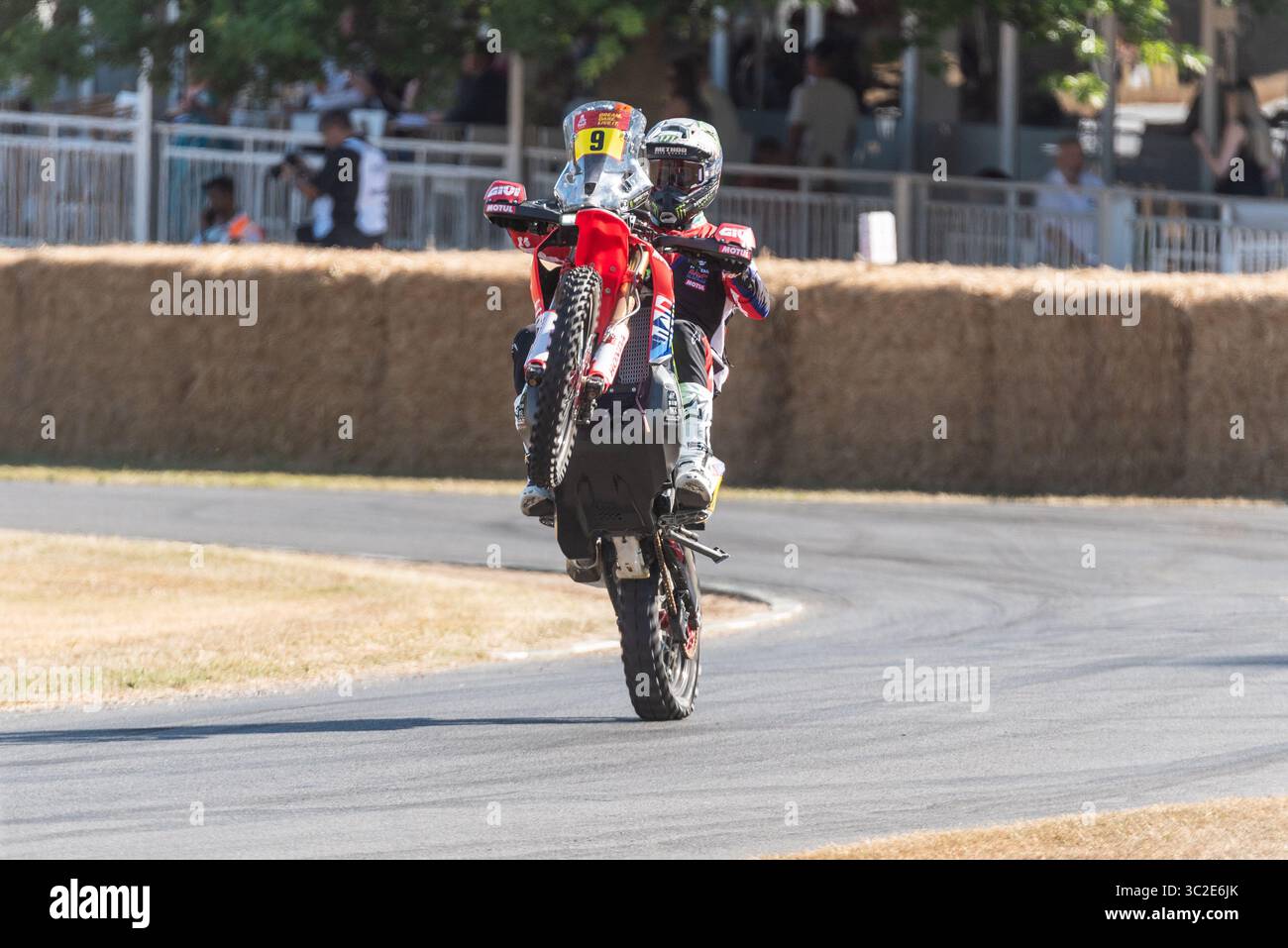 2025 Honda CRF450 Rally motocross motorcycle riding up the hillclimb ...