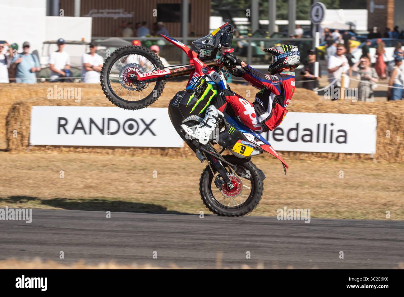 2025 Honda CRF450 Rally motocross motorcycle riding up the hillclimb ...