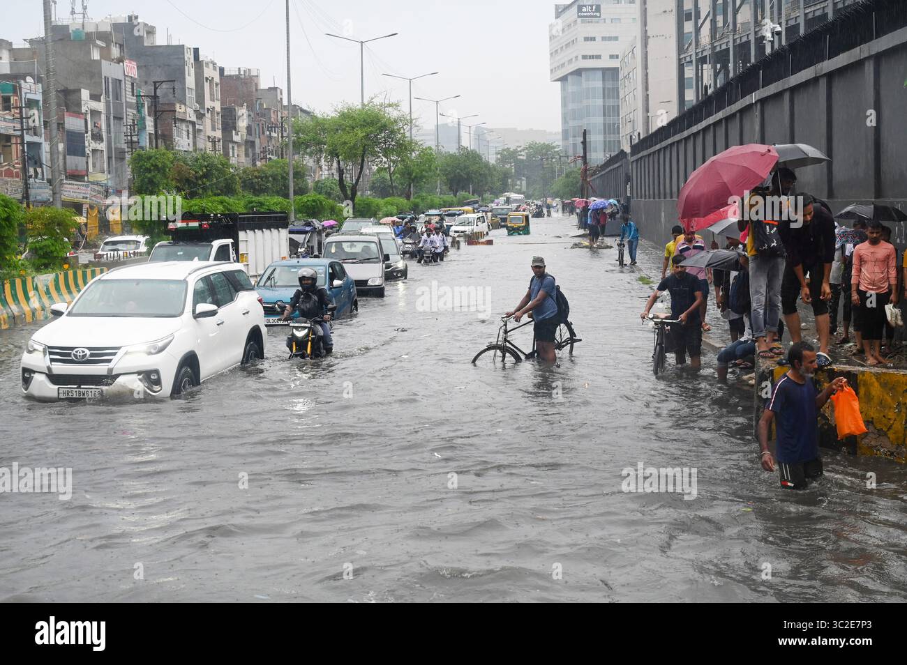 New Delhi, India. 24th July, 2025. NOIDA, INDIA - JULY 23: Heavy rain ...