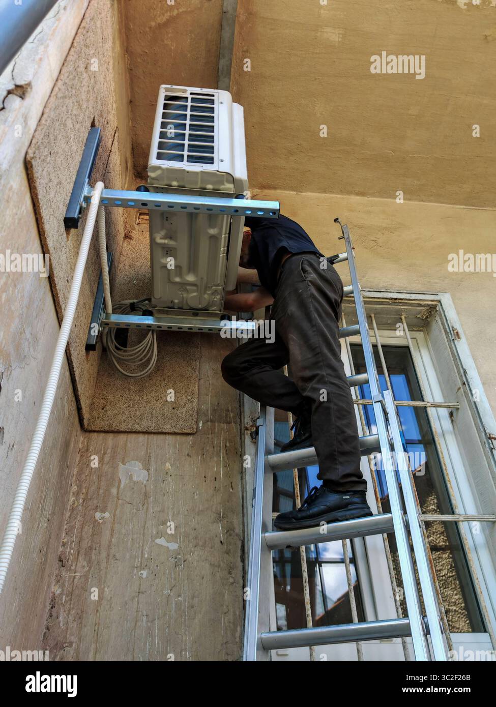 a ladder for climbing up when people working at height a ladder for ...