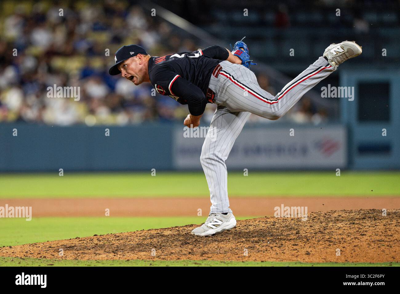 Minnesota Twins pitcher Anthony Misiewicz (57) throws during a MLB game ...