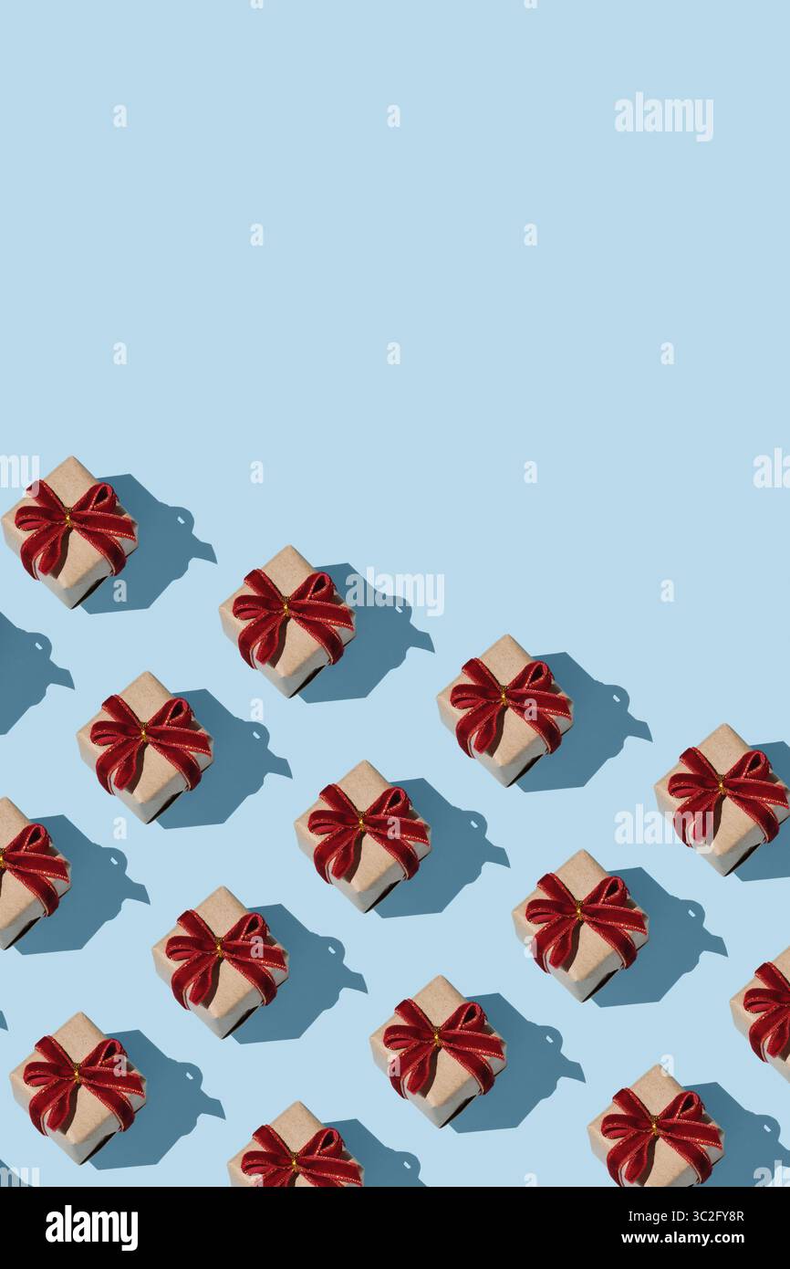 Vertical banner featuring a pattern of brown kraft gift boxes with red ...